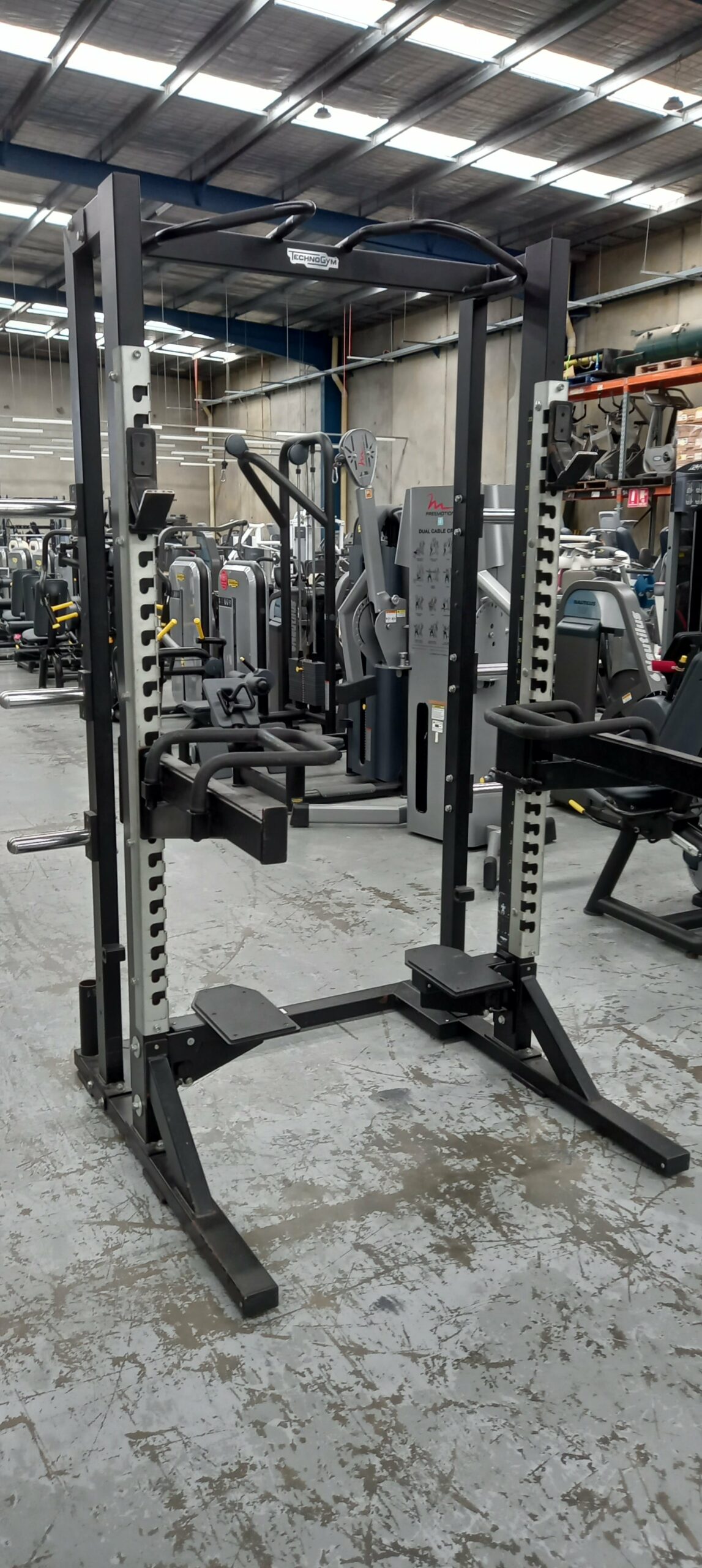 Technogym Pure Strength Olympic Half Rack | Grays Fitness